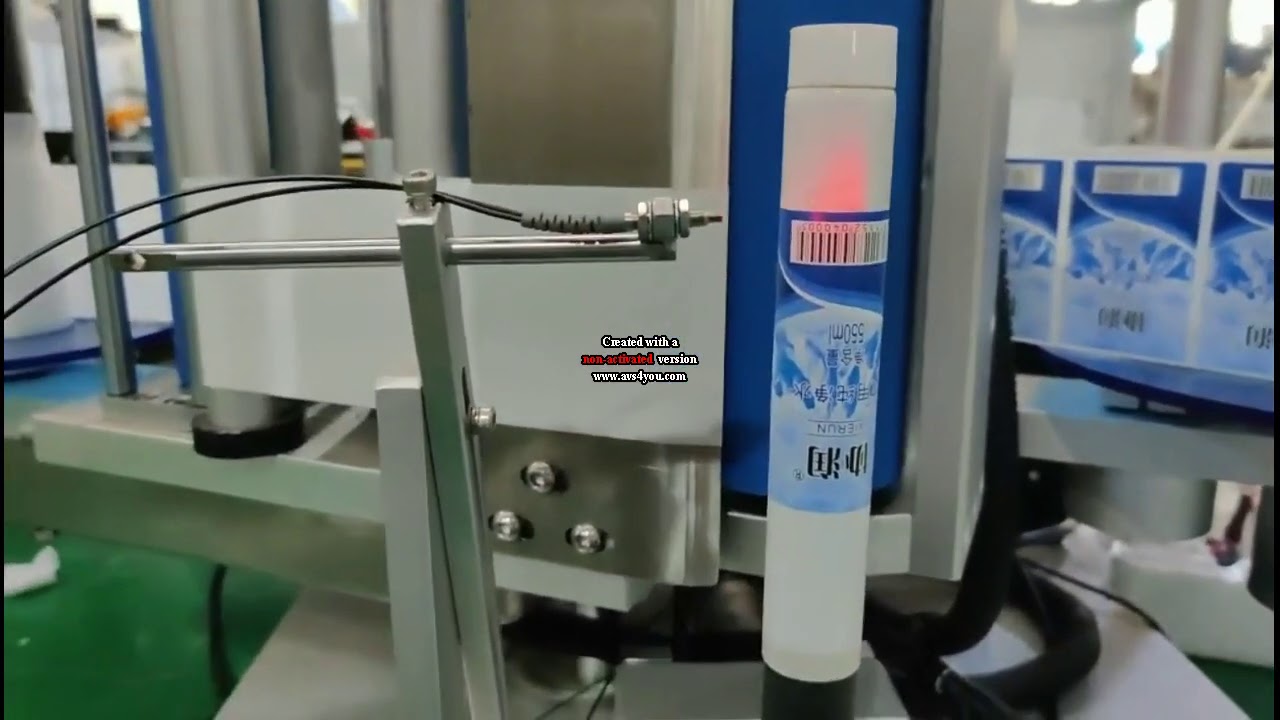 test run video of tube labeler - YouTube