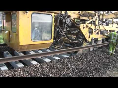 A Train Laying Its Own Track.flv - YouTube