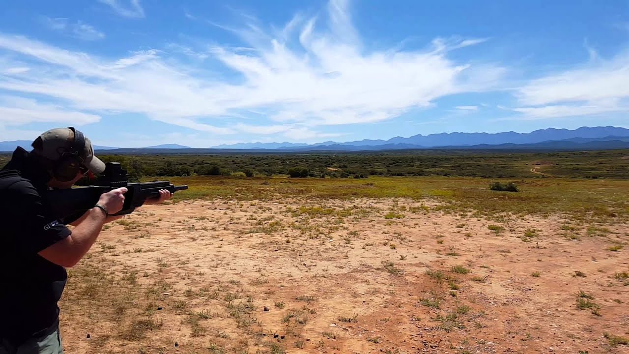 MS Shooting a PMP Nkunzi PAW 20X42mm Rifle with a SAPHEI round at a car ...