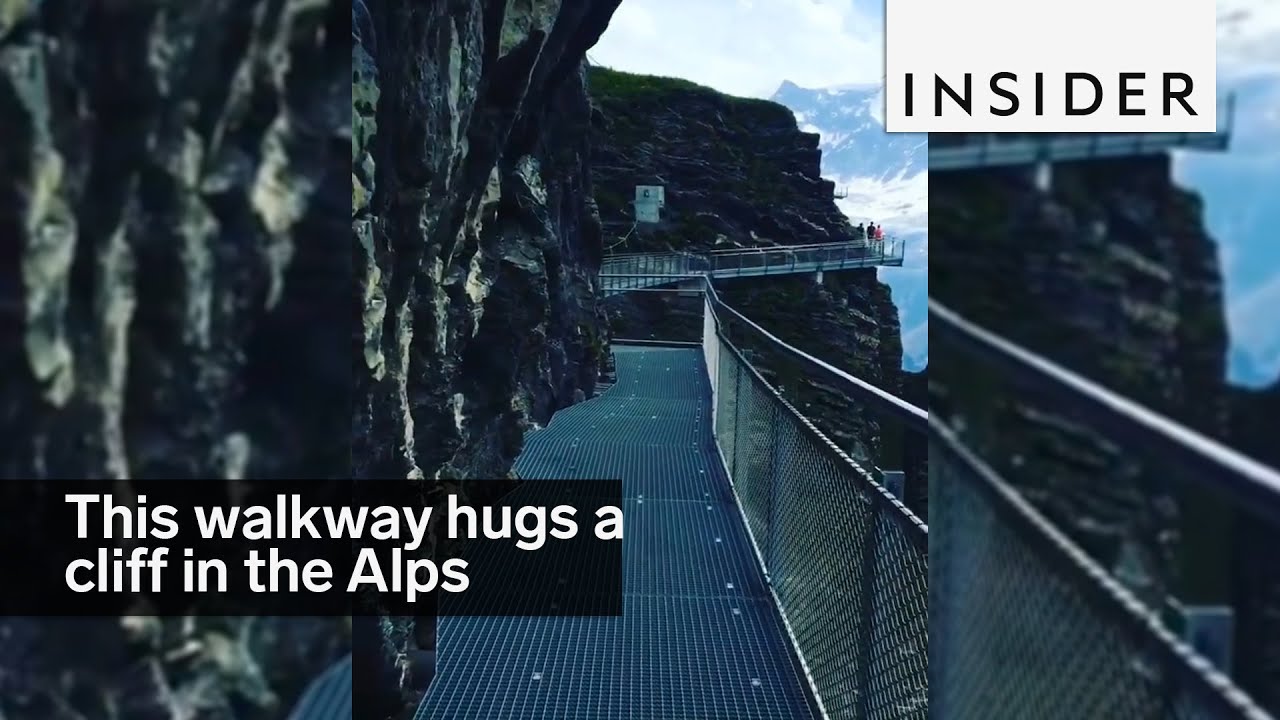 This terrifying walkway hugs a rugged cliff in the Alps - YouTube