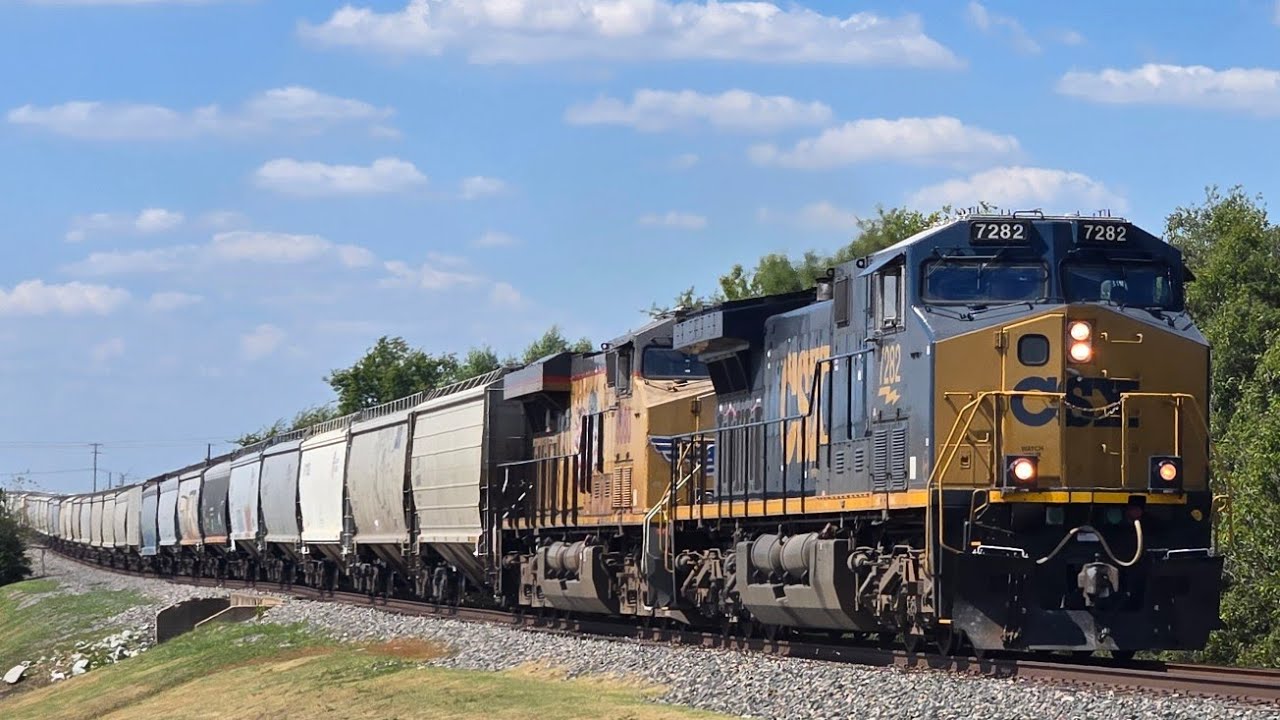 CSX 7282 leads a northbound grain train through Hutto Texas - YouTube
