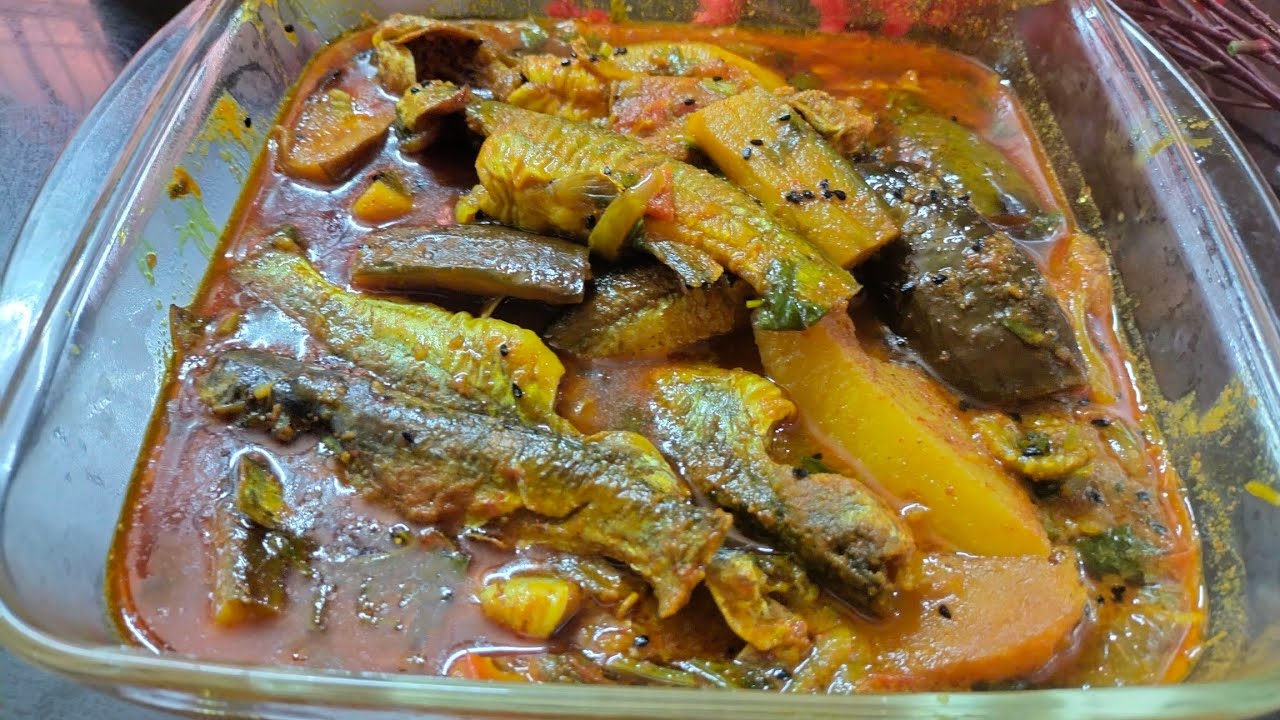 Begun Tangra / Tangra Macher jhol Bengali fish recipe - YouTube