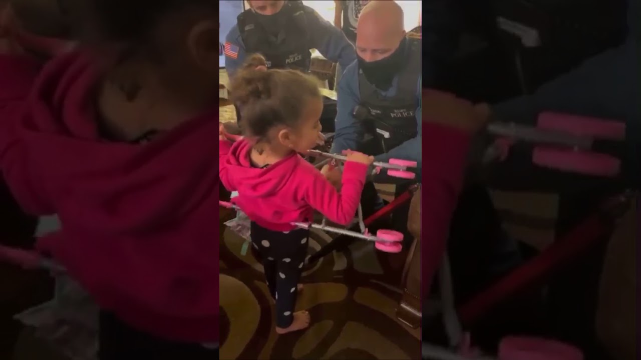 Paramus police officers rescue girl stuck in stroller - YouTube