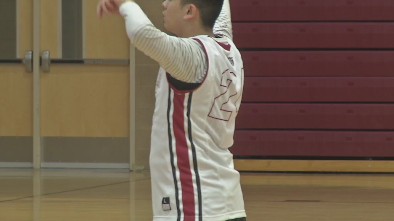 Autistic basketball player scores first points - YouTube