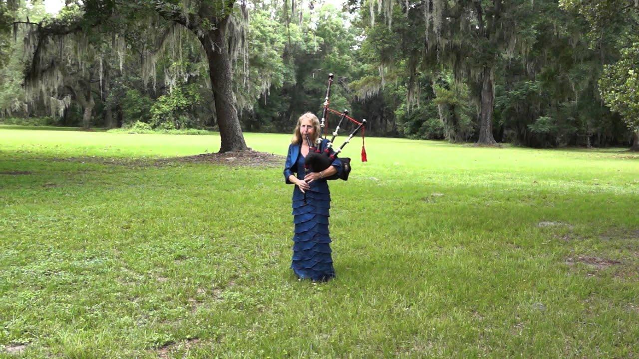 Lady Bagpiper Pat Playing Scotland the Brave in a Blue Formal Dress ...