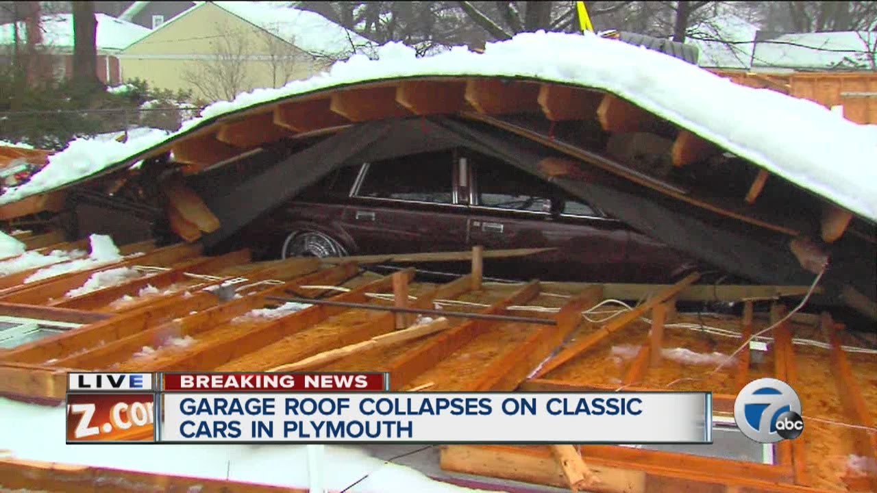 Garage roof collapses on classic cars in Plymouth - YouTube