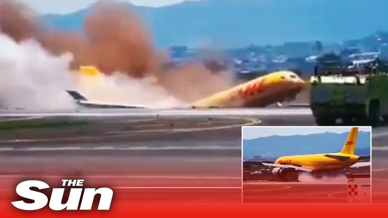 Dramatic moment plane splits in two on runway after crash landing at ...