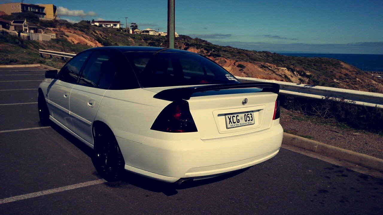 VZ V6 commodore with straight through mufflers - YouTube