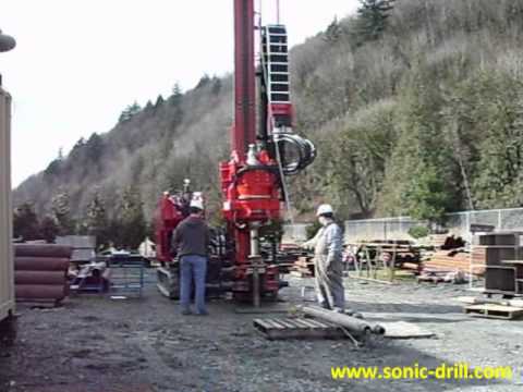Watch a sonic drill rig buzz through the ground! - YouTube