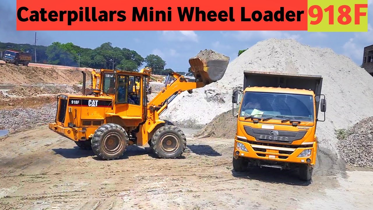 Caterpillar 918F Wheel Loader Loading Eicher Truck | Caterpillar 918F ...