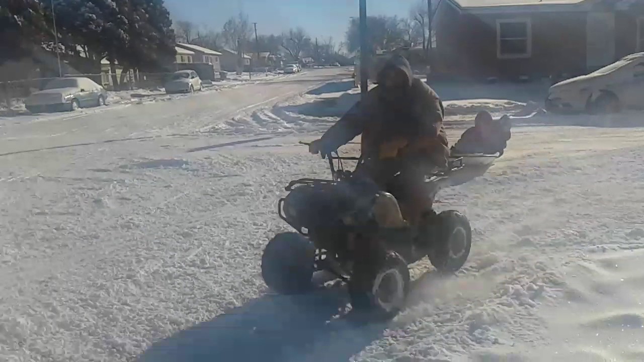 4 wheel sledding in the snow - YouTube
