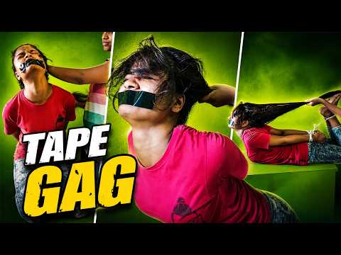 Tape Gag 🤐 #tapegag #gagged #gaggedvideos #handgag #cleavegag #stuffgag #otmgag #kidnapvideos