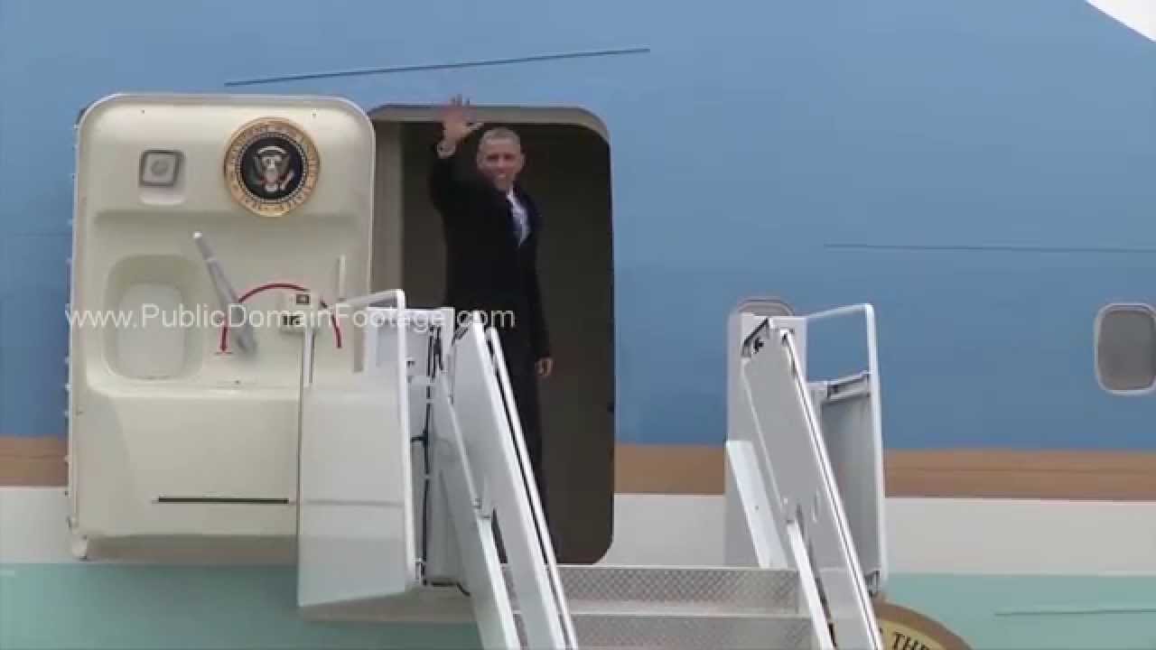 President Obama enters Air Force One and waves goodbye stock footage ...