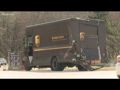 UPS truck clipped by train in Flowery Branch - YouTube