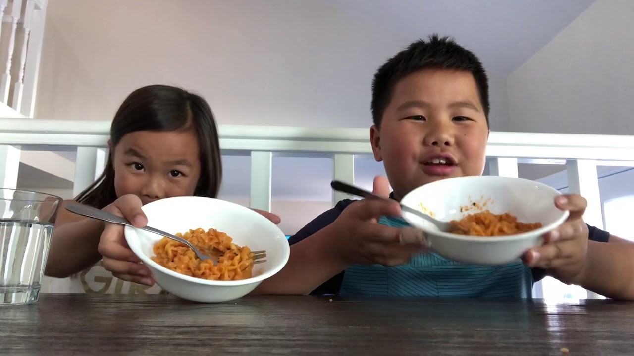 Spicy noodle challenge with Ryan - YouTube