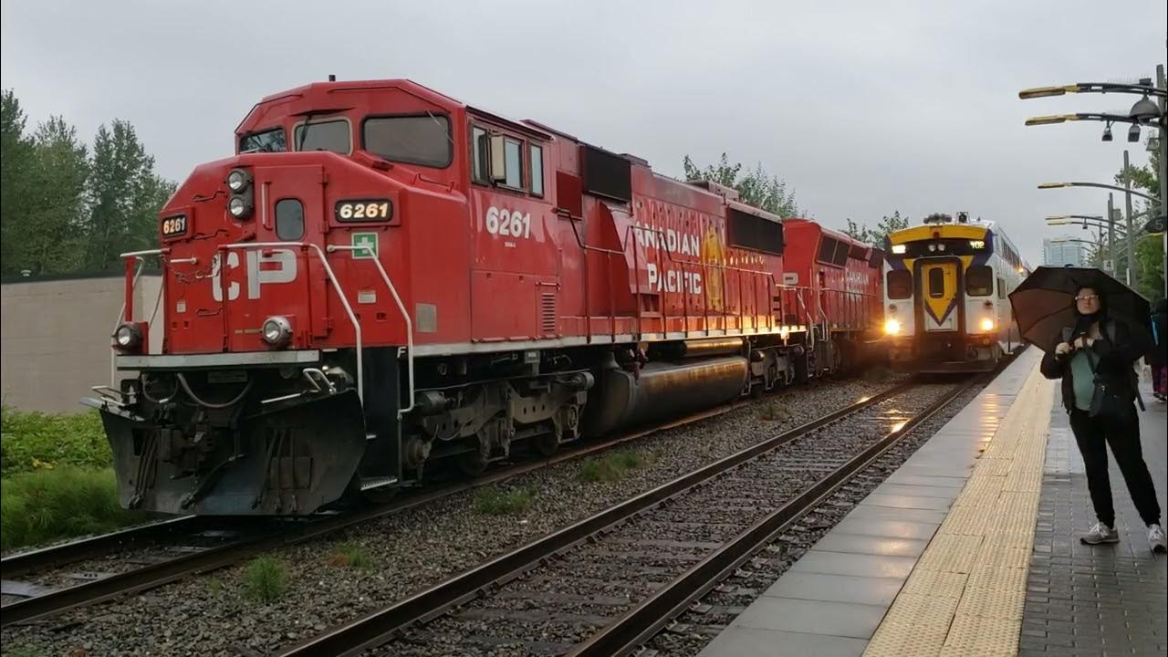 CP 6261 Triclops being scooped by West Coast Express Train 5 West - YouTube