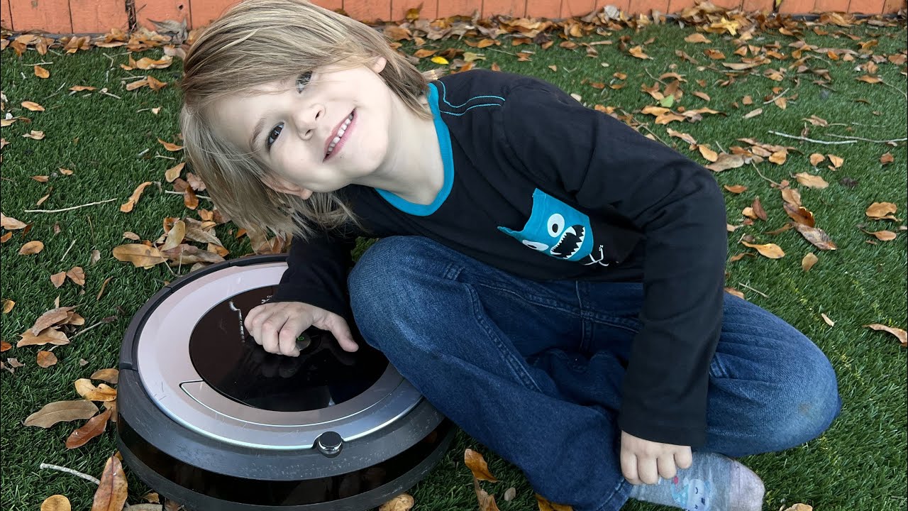 iRobot Roomba cleans all the leaves off turf grass in the backyard ...