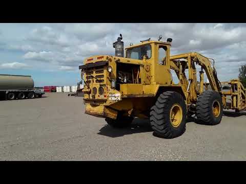PATRICK WHEEL LOADER WITH FORK EXTENSIONS - YouTube