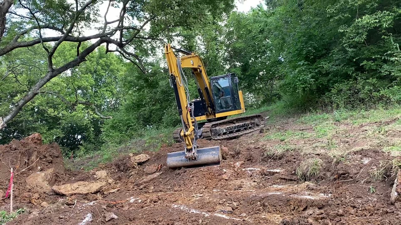 Cat 310 Next Generation Excavator - YouTube