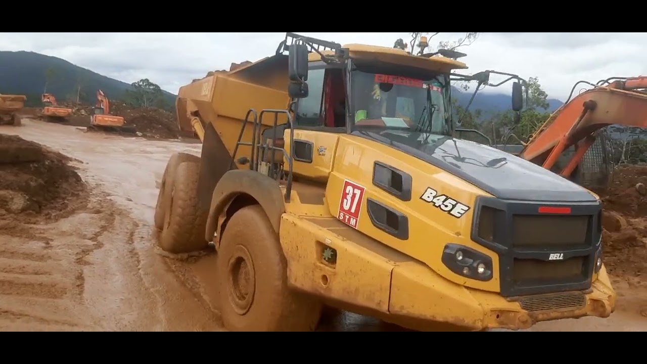 ADT BELL B45E at nickel mine with mud road - YouTube