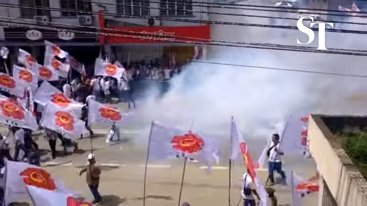 Malaysia GE15: Police fire tear gas as supporters cause commotion ...