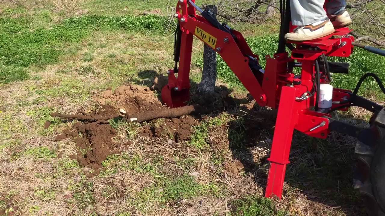 Backhoe VIP10 can excavate tree roots. - YouTube