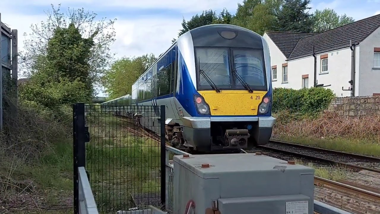 NIR 4000 Class DMUs 4020 & 4019 at Antrim Station Level crossing. 10/5 ...