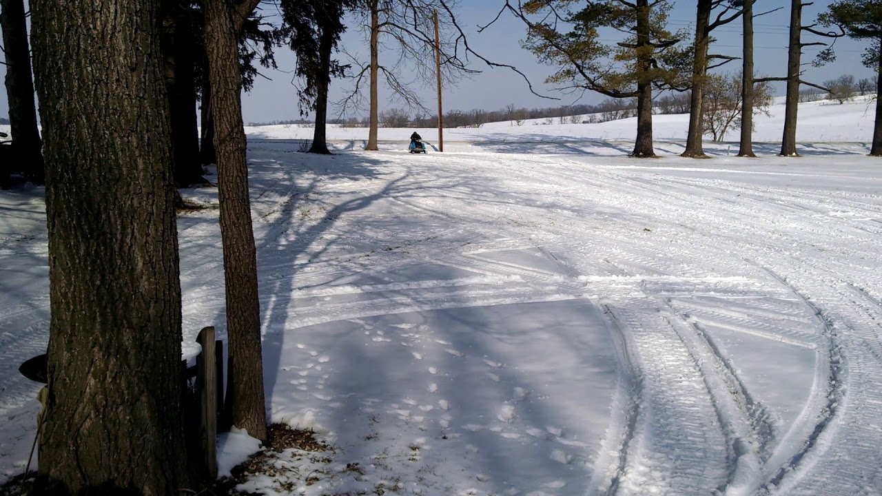 Dad on his face sled 1975 Sno-Jet SST 340 f/a with a GYT kit - YouTube