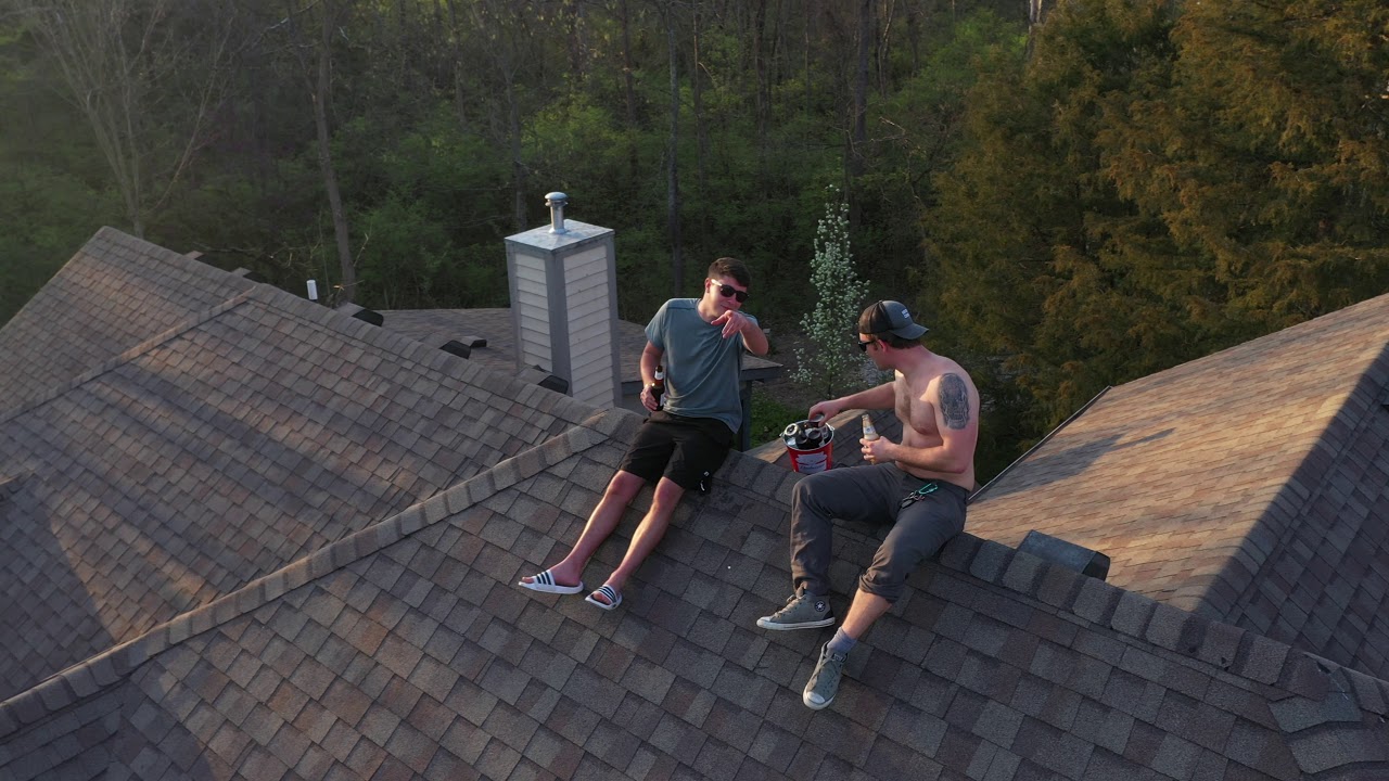 Neighbor social distancing and drinking beer on roof Part 1 - YouTube
