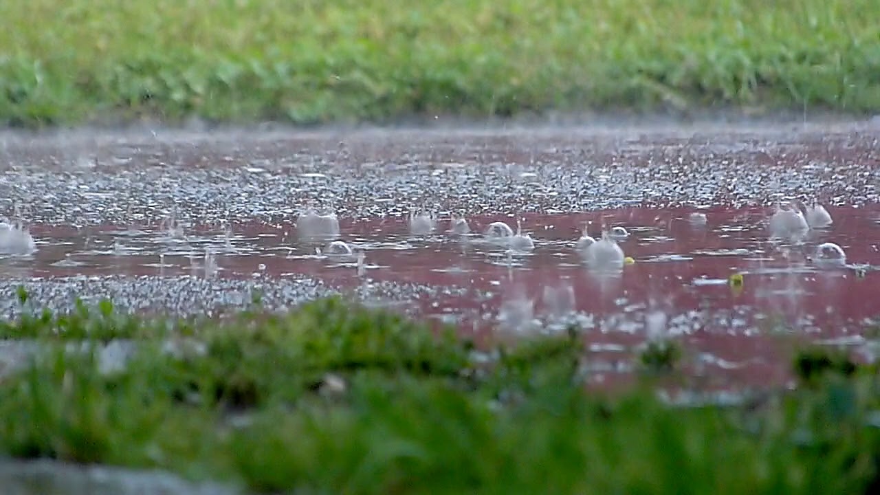 Rain drops falling on the ground in slow motion - 4K HD - YouTube