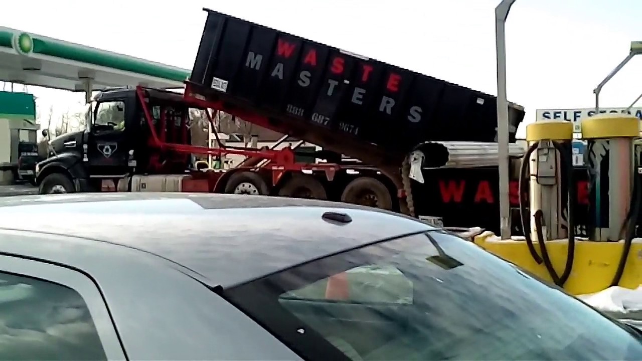 Waste masters solutions roll off container service - YouTube