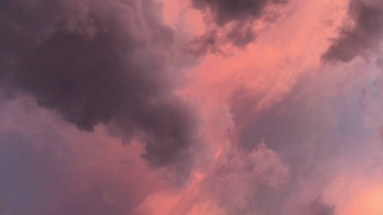 Pink sky post thunderstorm - YouTube