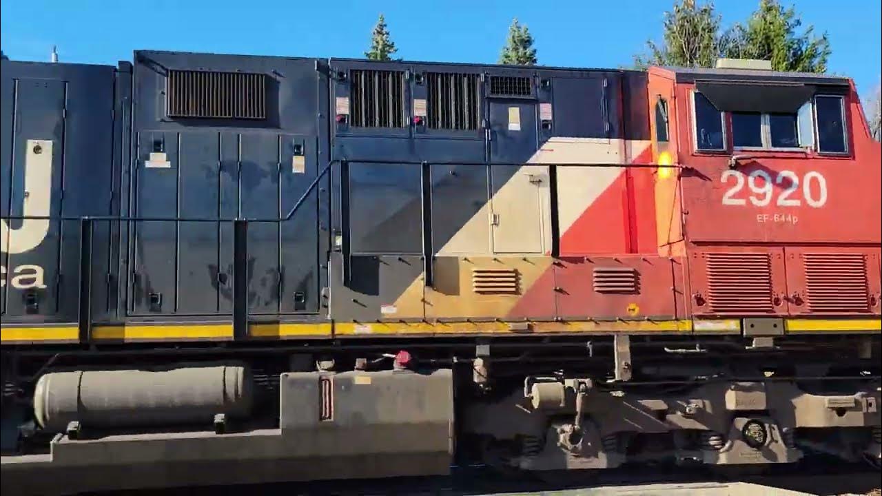 CN 3285, 2920 pull Eastbound freight train with CN 3123 pushing - YouTube