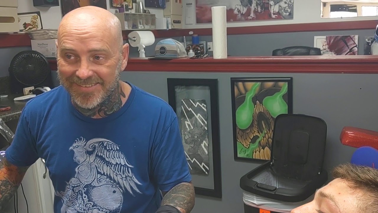 Daniel getting his rib tattoo pt2 - YouTube