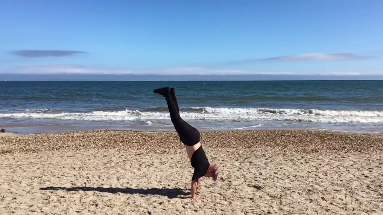Roundoff, double back handspring and back tuck at the beach. - YouTube