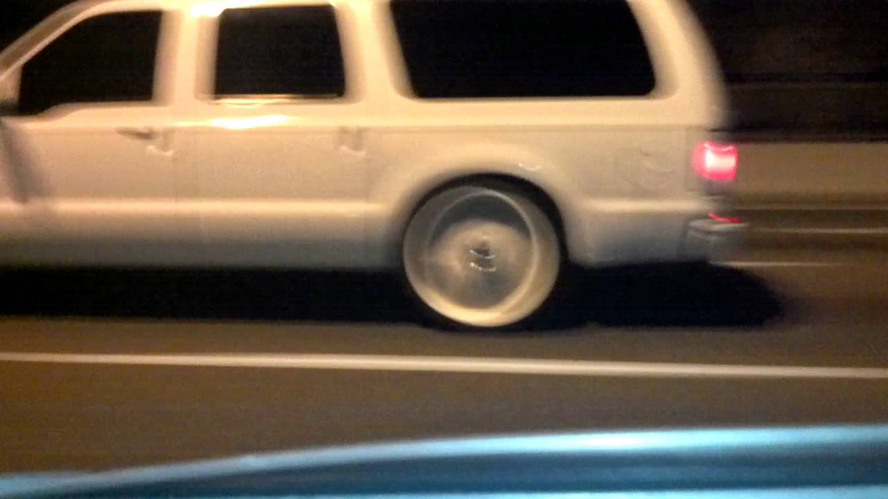 Ford excursion lowered on 26's - YouTube
