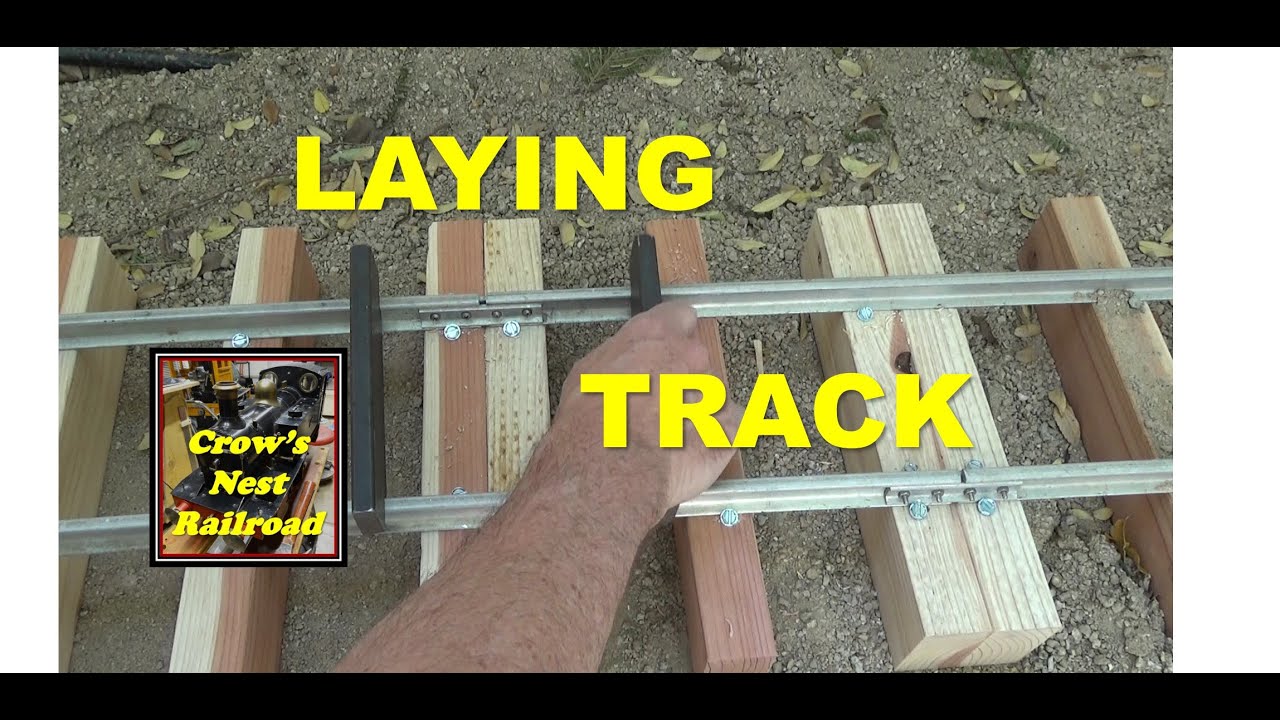 Putting track panels in place on my back yard 5" gauge railroad. CNRR ...