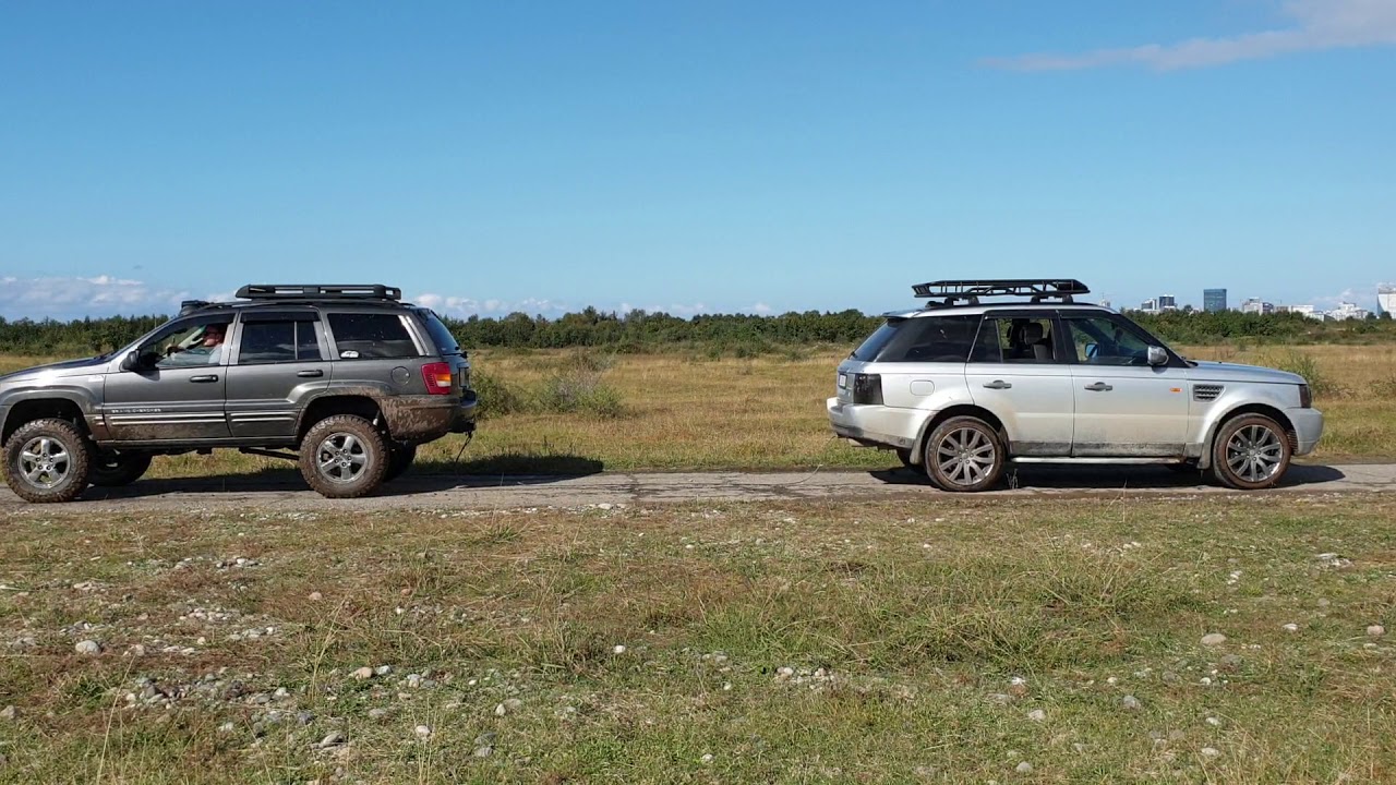 range rover sport vs grand cherokee tug of war - YouTube