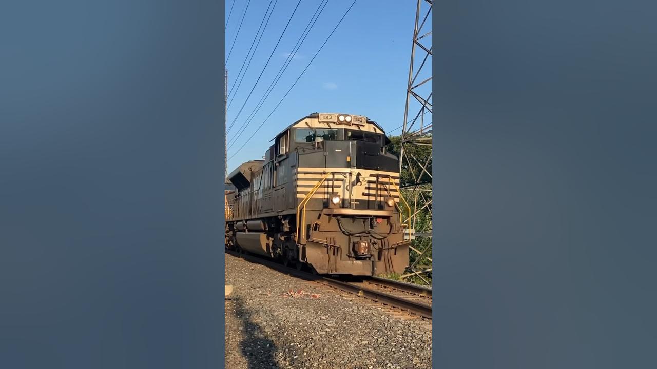 NS 1143 SD70ACE leads NS 65K through Bound Brook, NJ with a fouled horn and a UP trailing! - YouTube