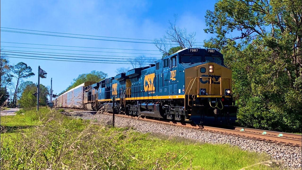 CSX I025-21 with 2 freshly rebuilt AC44s with CSX 7087 leading with a ...