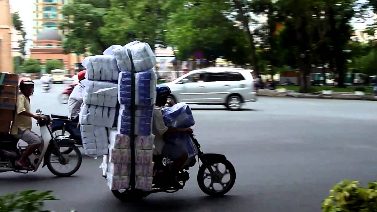 Over Loaded Scooter In Ho Chi Min City (Saigon) Vietnam - YouTube