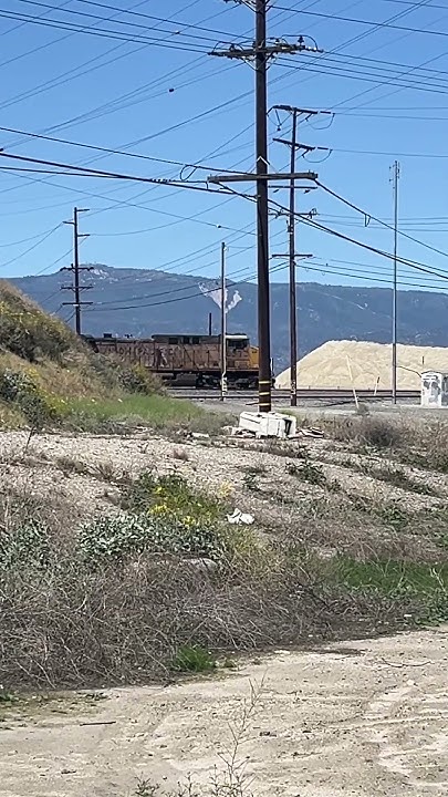 4/19/2025: UP 6573 and 7436 with an WB Manifest Train as Rear DPUs standing in Colton, CA - YouTube