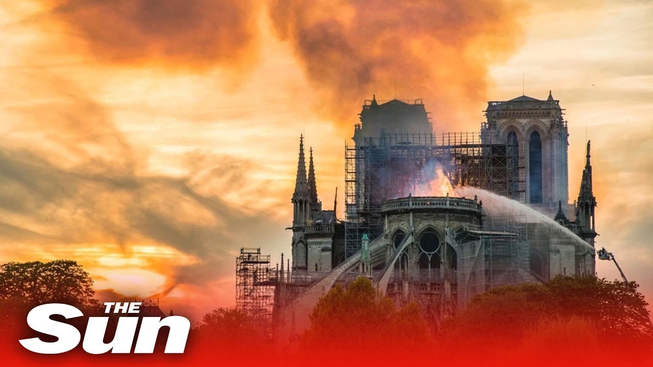 Notre Dame fire: spire collapses as inferno rages below - YouTube