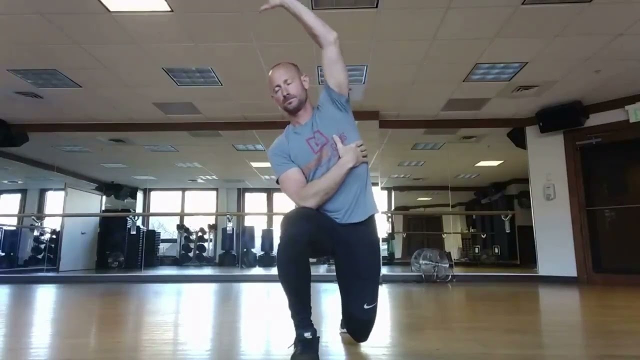 Movement Prep and Mobility Flow with coach Kyle (This one uses a dowel ...