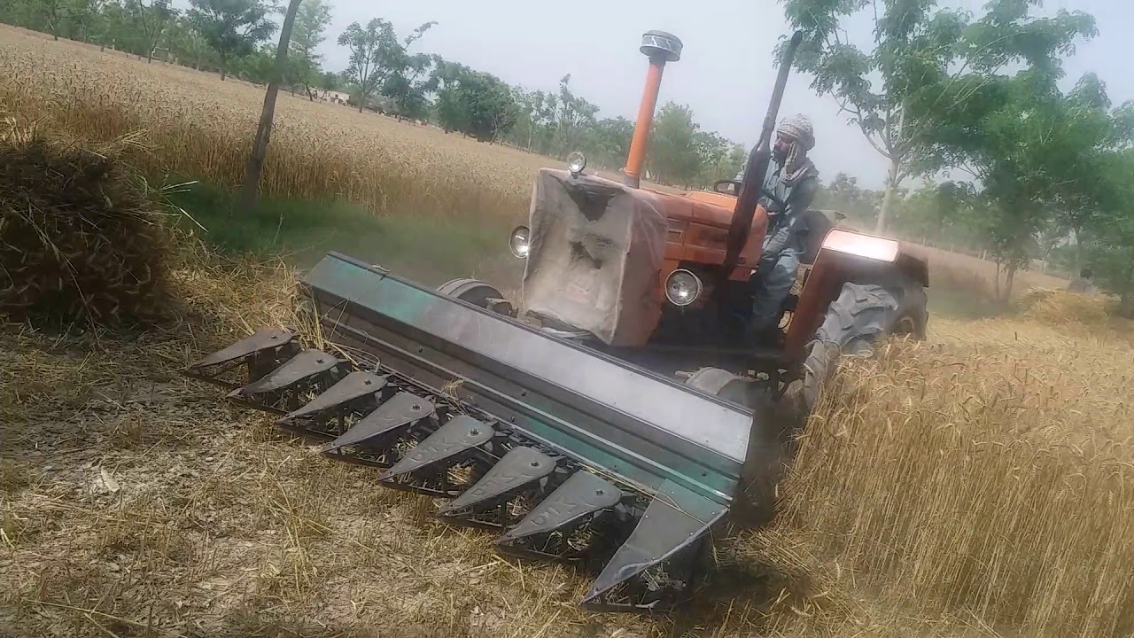 Wheat Reaper||Wheat Cutting Machine Driven By Tractor In Pakistani ...