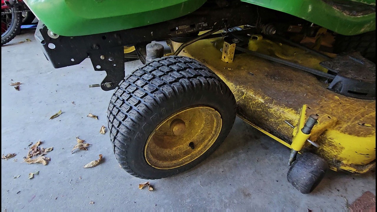 How to remove front wheel from riding mower - YouTube