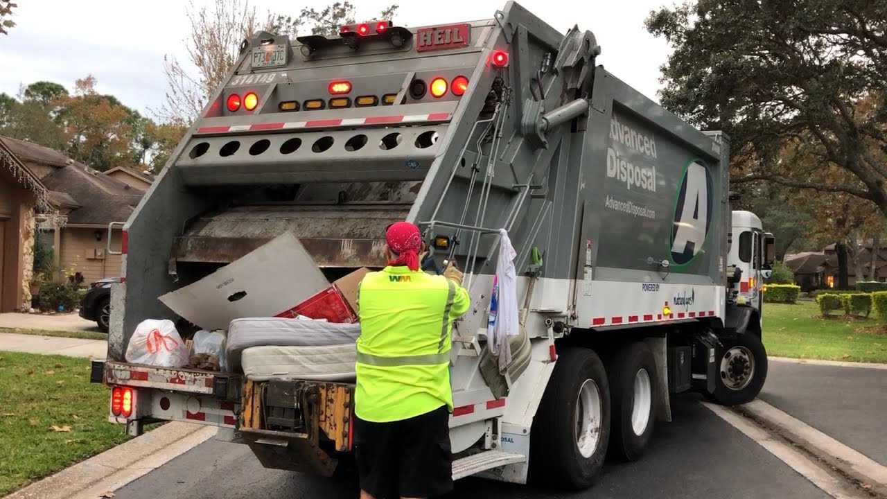 Advanced Disposal Rear Loader Garbage Truck on Manual Trash with ...