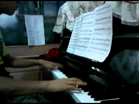 Christopher Melky Tanujaya playing piano - YouTube