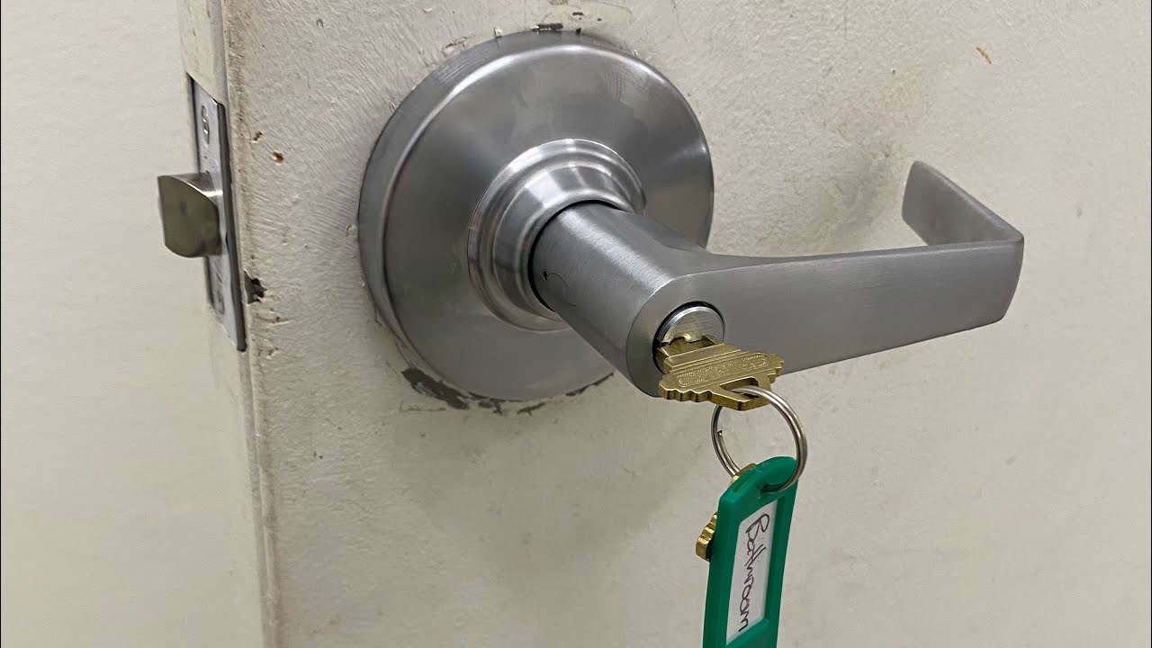Installing a storeroom function lever lock on a bathroom - YouTube