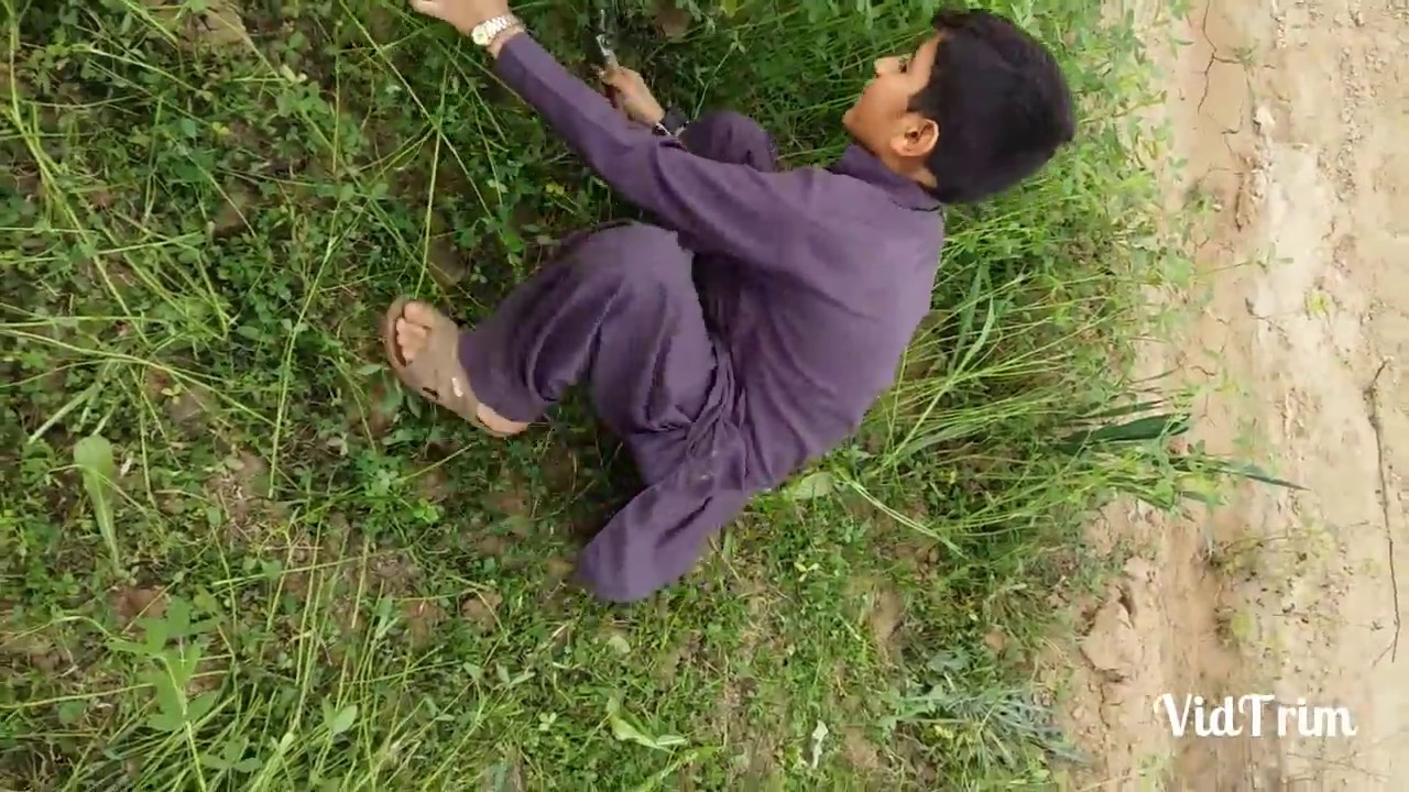 small boy cutting grass Ariel - YouTube